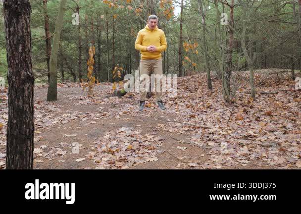 Middle Aged Person Jumping Outside Fall Woodland Workout, Energetic ...
