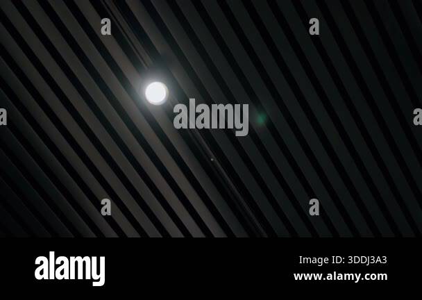 Dark ceiling with modern parallel led lights and light flare. Ideal for ...