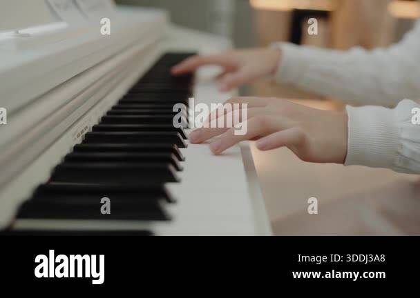 Teenage girl practicing piano at home. Study and learning development ...