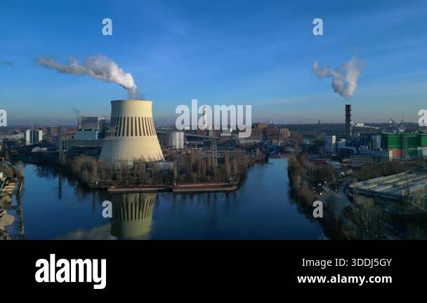 Aerial view of a large hard coal fired power plant with a cooling tower ...