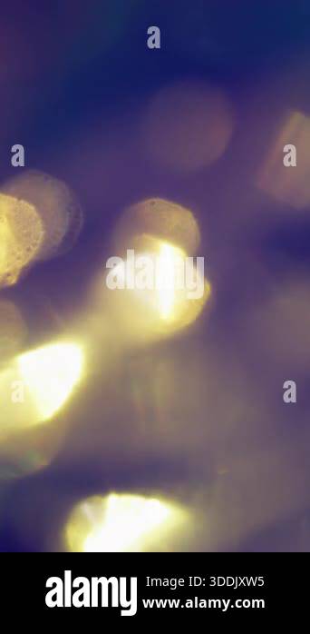 Vertical video. Color blur flare. Spectrum lens bokeh. Sparkling light ...