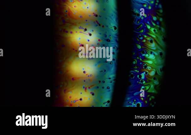 Spectrum soap. Round lens flare. Blur striped colorful curl glow in ...