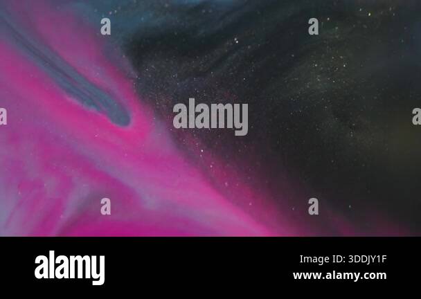 Shimmer ink. Flowing color liquid. Defocused pink purple blue water ...