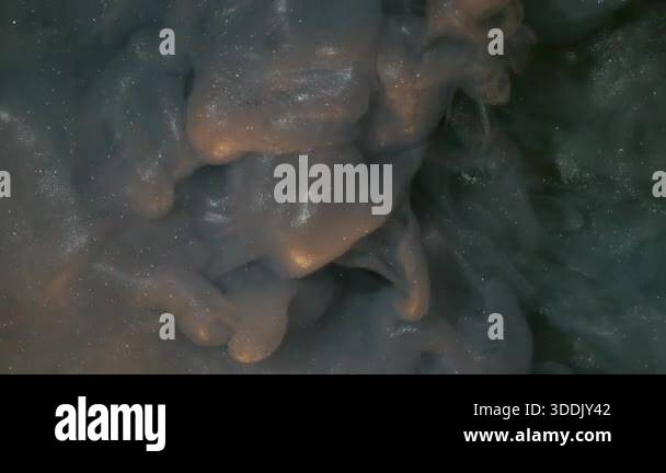 Paint explosion drop. Glitter fume pigment. Defocused blue purple color ...