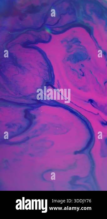 Vertical video. Defocused shiny emulsion. Prism fluid. Neon color ...