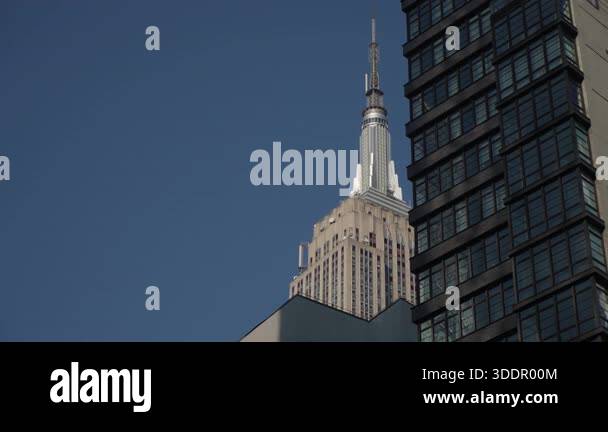 Spire Peeking Between Modern Glass Facades. Architectural Photographer ...