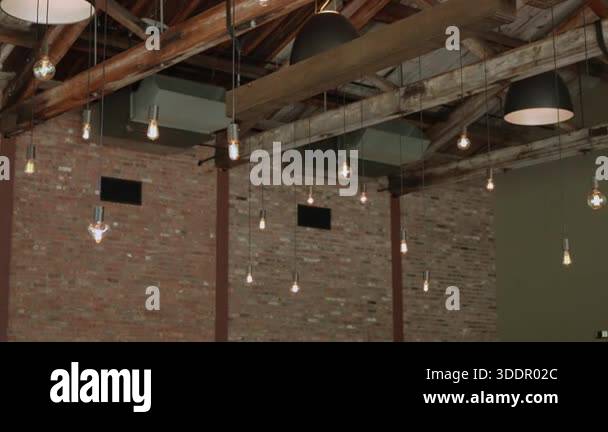 Exposed Brick Loft Ceiling With Lights Warm Edison Pendants Hang From ...
