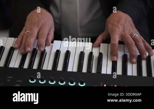Close Up Mature Hands On Keyboard, Rings And Wrinkles Visible, Playing ...
