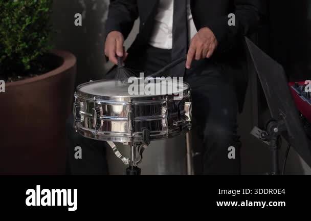 Male Drummer In Suit Plays Snare, Close Portrait In LowLit Lounge With ...