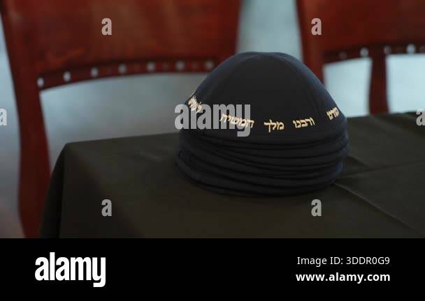 Navy Kippah Stacked On Tablecloth, Wooden Chairs Blurred Background ...