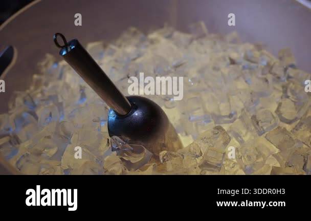 Closeup Metal Scoop In Ice Bucket, Stainless Scoop Nestled In Clear Ice ...