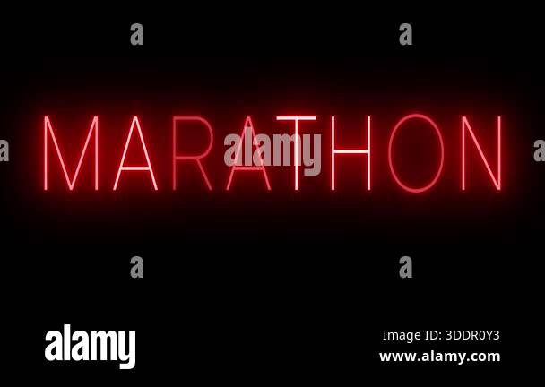 Flickering red retro style neon sign glowing against a black background ...