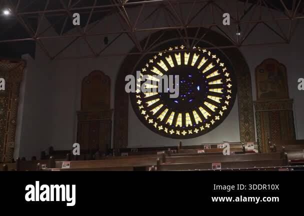 Illuminated Stained Glass Rose Window Inside Church, Warm Golden Light ...