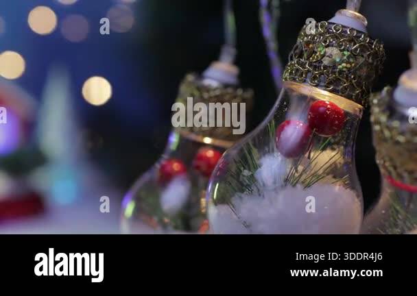 Large light bulbs decorated inside on a blurred background with a house ...