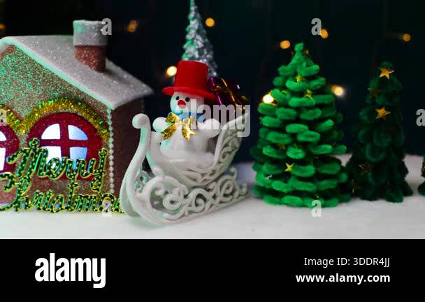 On a dark blue background with flashing lights among many Christmas ...