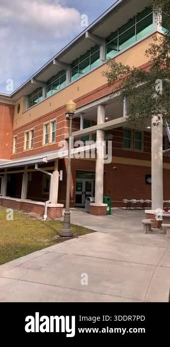 Orlando, Florida - 12.07.2023: A brick school campus with tall columns ...
