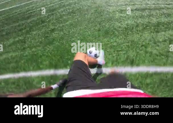 First person perspective of a professional football player dribbling ...