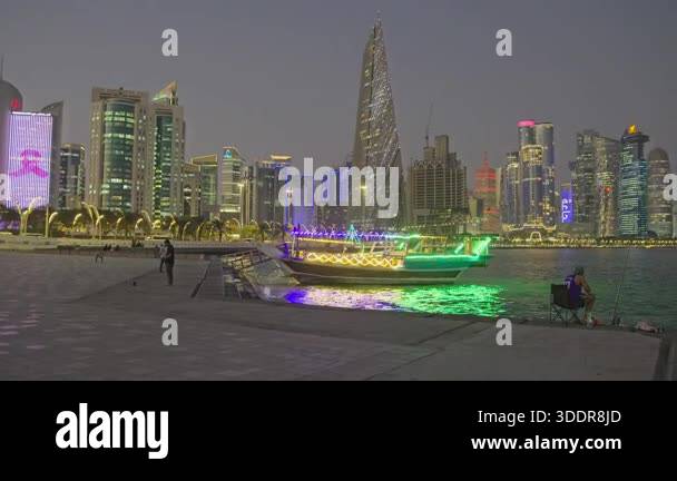 Doha, Qatar-October 21 2025: Doha skyline at night from the corniche ...