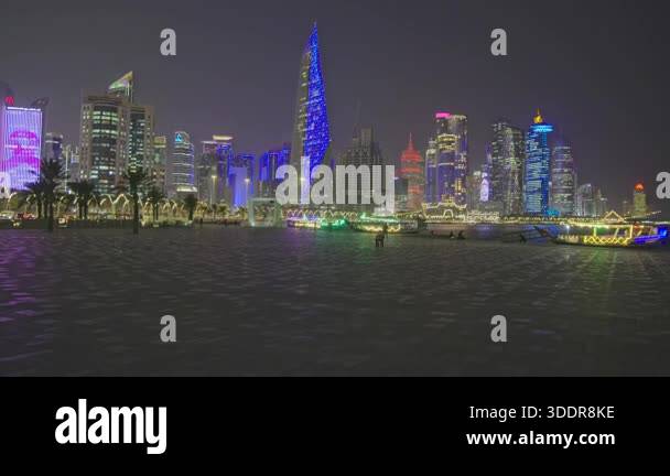 Doha, Qatar-October 21 2025: Doha skyline at night from the corniche ...