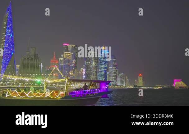 Doha, Qatar-October 21 2025: Doha skyline at night from the corniche ...