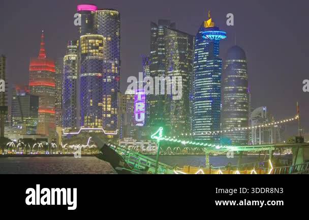 Doha, Qatar-October 21 2025: Doha skyline at night from the corniche ...