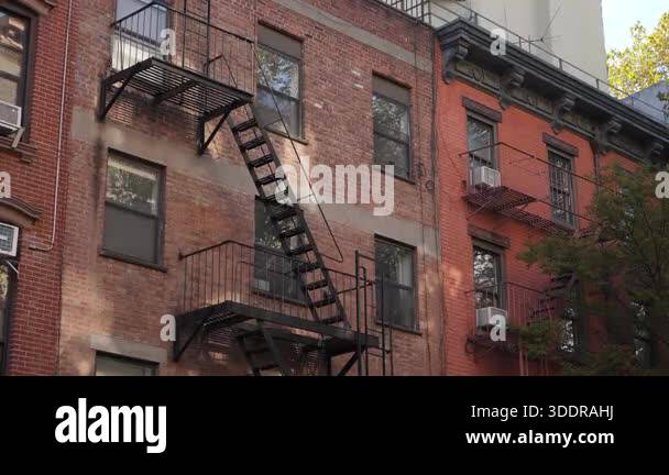 Brick Facade Iron Fire Escape Closeup, Weathered Red Brick And Metal ...