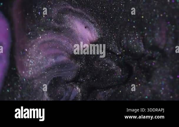 Shiny wave. Ink liquid. Defocused purple pink color splatter glitter ...