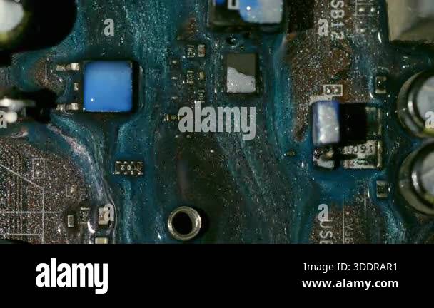 Ink pour. Digital microcircuit. Defocused blue orange colorful glitter ...