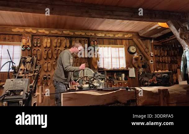 Zaanse Schans, Netherlands - October 27, 2025: Step 2 Carpenter man in ...