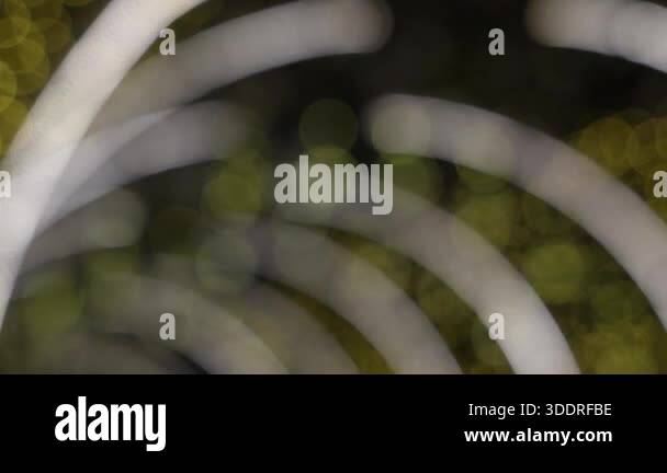 Warm golden bokeh fills the frame with soft circles of unfocused light ...