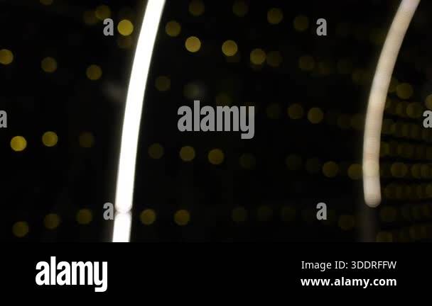 Warm golden bokeh fills the frame with soft circles of unfocused light ...