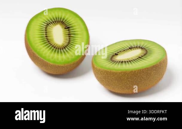 Ultra-realistic 3D animation of a whole and sliced kiwi rotating on a ...