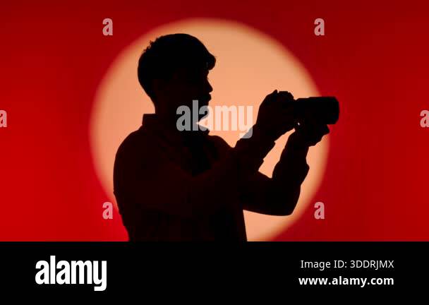 Backstage at a professional studio with silhouette of a person holding ...