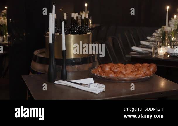 Braided Challah Bread On Table Set Beside Tall Candles, Wine Bucket ...