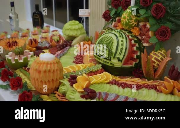 Elaborate Fruit Carving Buffet Display Featuring Carved Watermelon ...