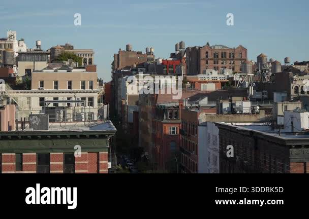 Rooftop Panorama Of Dense City Blocks, LowRise Buildings And Water ...