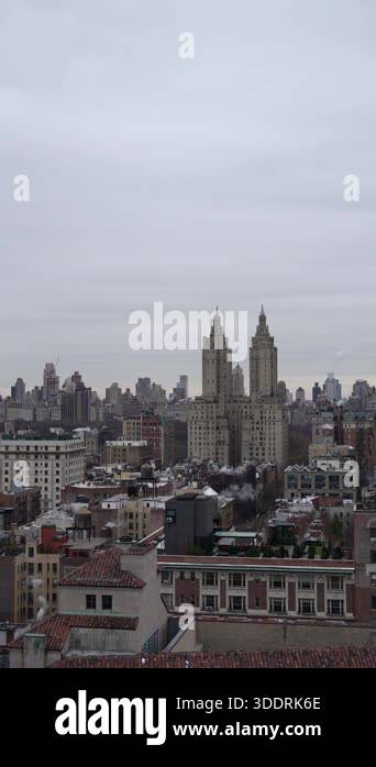 Historic Twin Towers Over Rooftop Panorama, Terracotta Roofs And Ornate ...