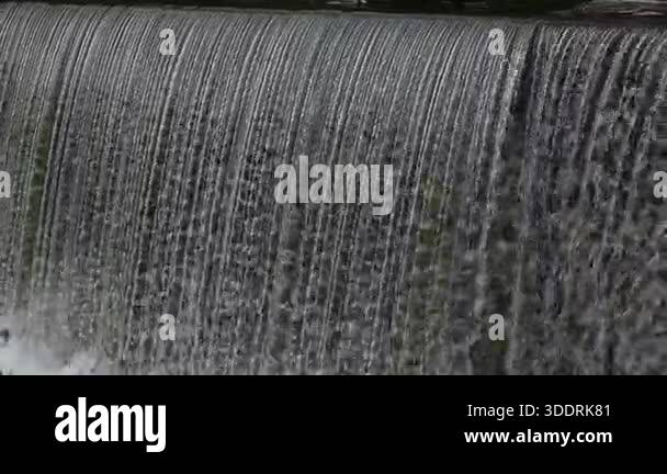 Water Cascading Over Concrete Dam Spillway, Long Silver Curtain Of ...