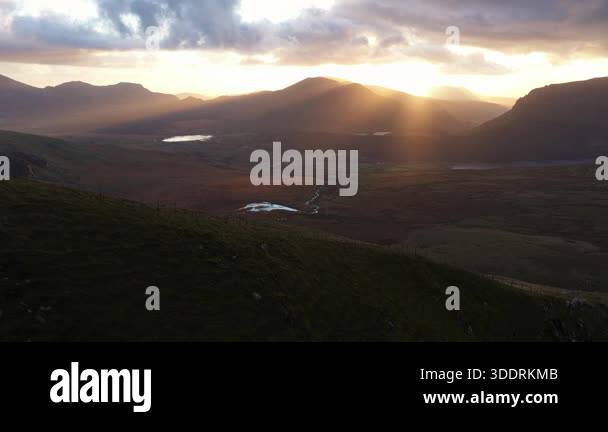 Aerial drone views of sunset over Snowdonia National Park in North ...
