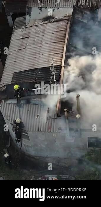 Fighting a major fire in a residential area: an aerial view of ...