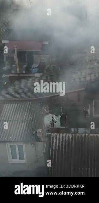 Fighting a major fire in a residential area: an aerial view of ...