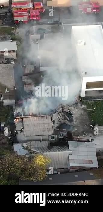 Fighting a major fire in a residential area: an aerial view of ...