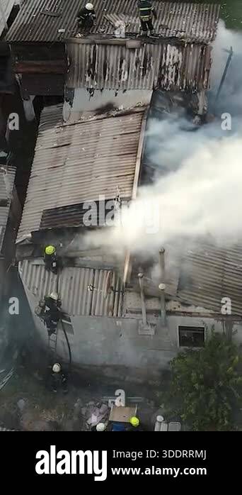 Fighting a major fire in a residential area: an aerial view of ...
