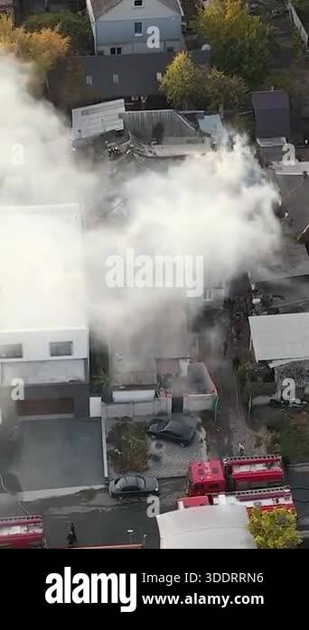 Fighting a major fire in a residential area: an aerial view of ...