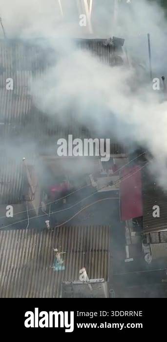 Fighting a major fire in a residential area: an aerial view of ...