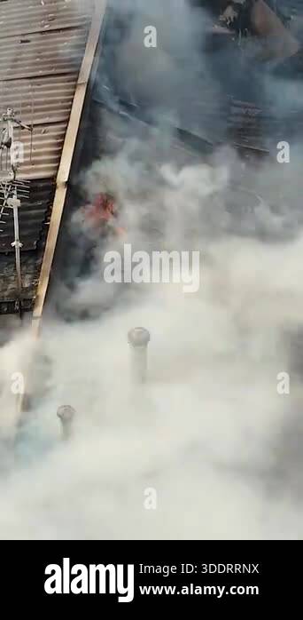 Fighting a major fire in a residential area: an aerial view of ...
