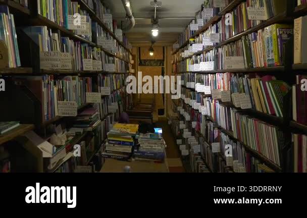 There are many books in the book depository of the old library. There ...