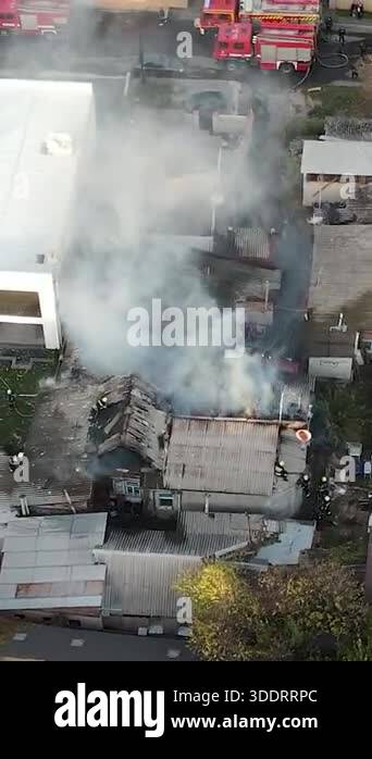Fighting a major fire in a residential area: an aerial view of ...