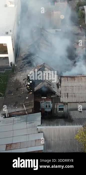 Fighting a major fire in a residential area: an aerial view of ...