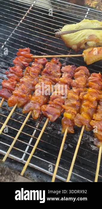 Cooking food on roadside bbq Stock Videos & Footage - HD and 4K Video ...